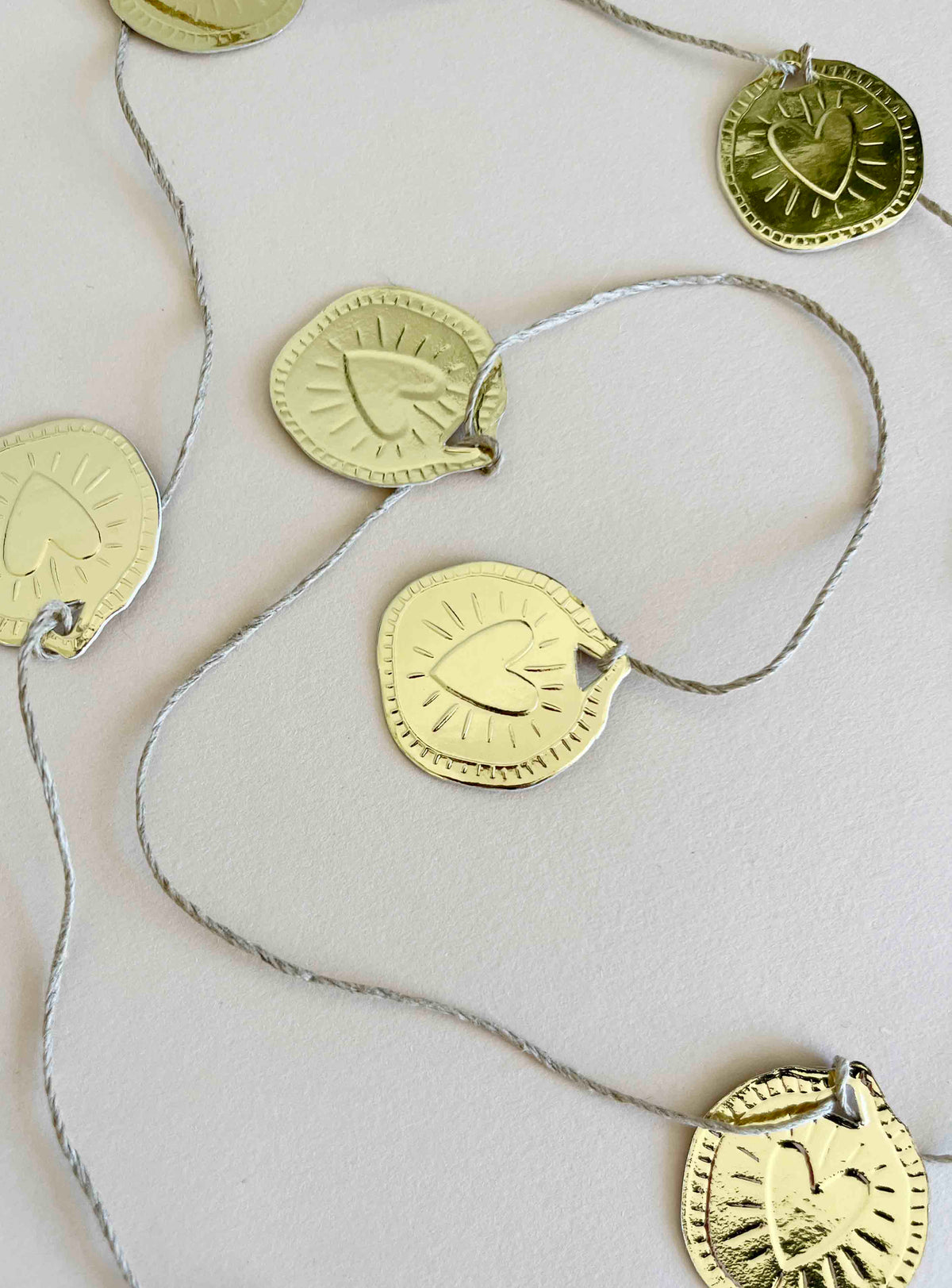 String Of Hearts - Gold | THE LITTLE PRESS